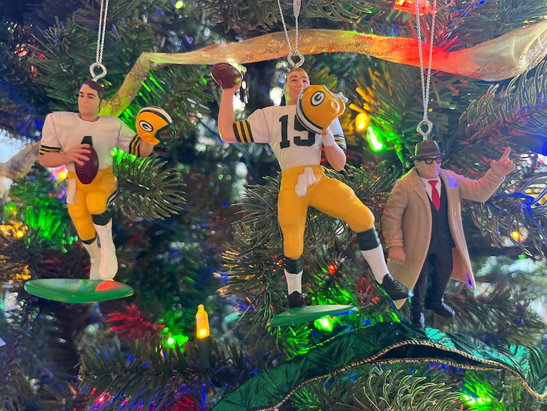 Green Bay Packer Legends Vince Lombardi, Bart Starr, and Brett Favre ...