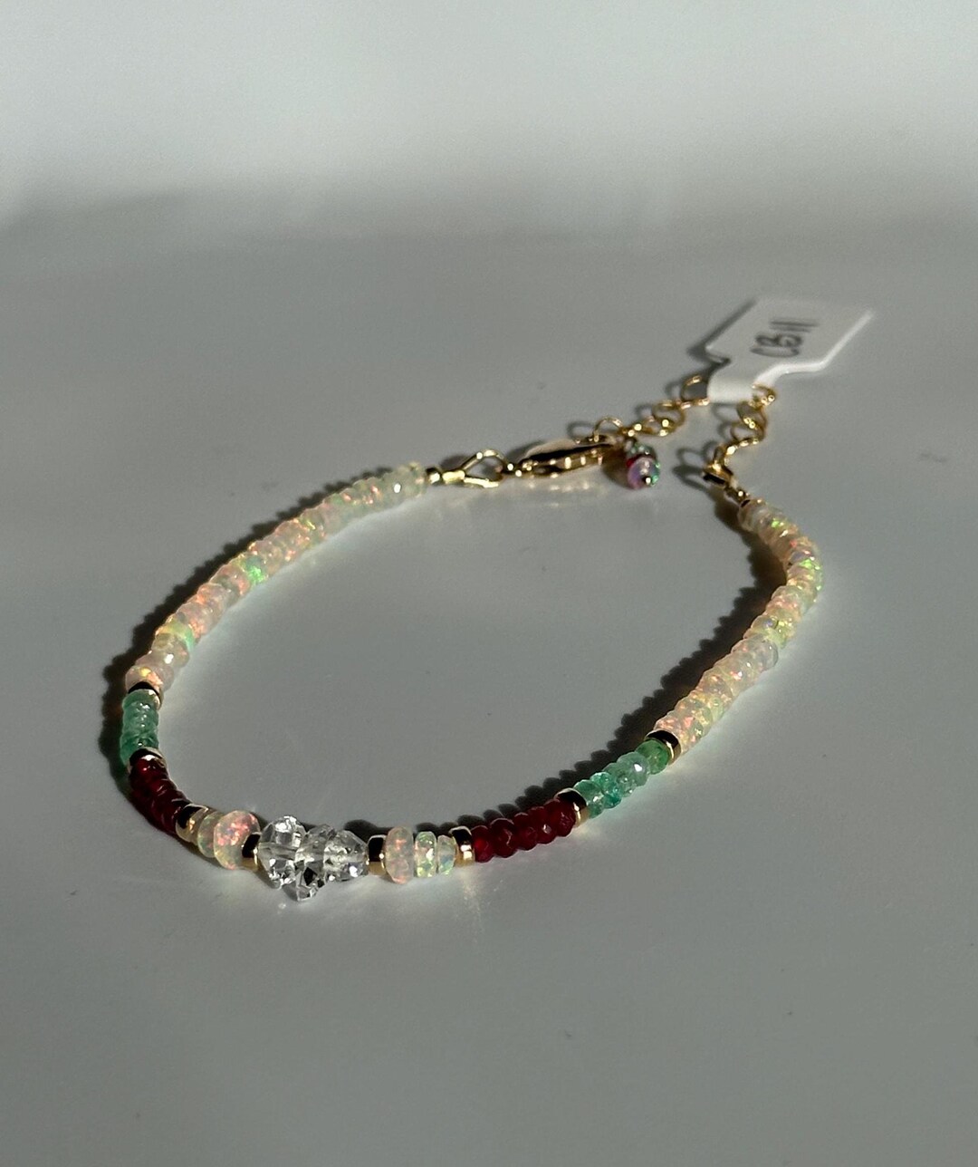 Ultra Luxe Columbian Emerald, Longido Ruby, Ethiopian Welo Opal and ...
