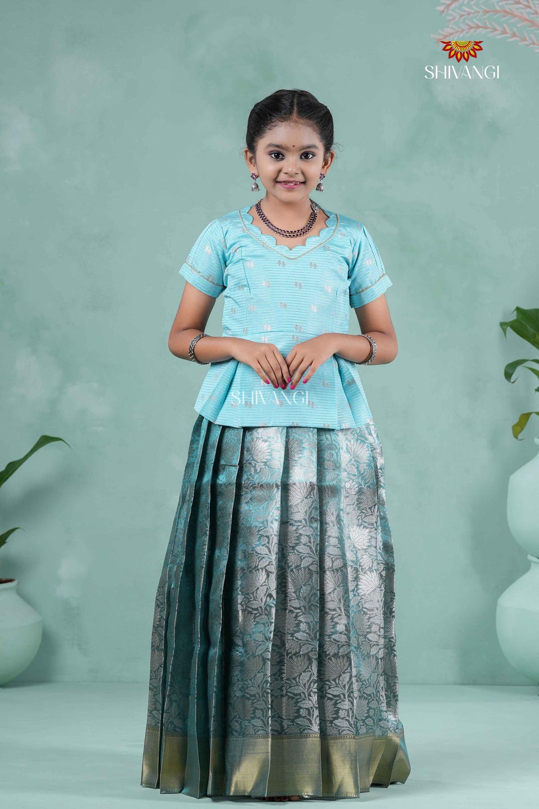 Shivangi Clothing Sky Blue Traditional Silver Jasmine Pattu Pavadai Set ...