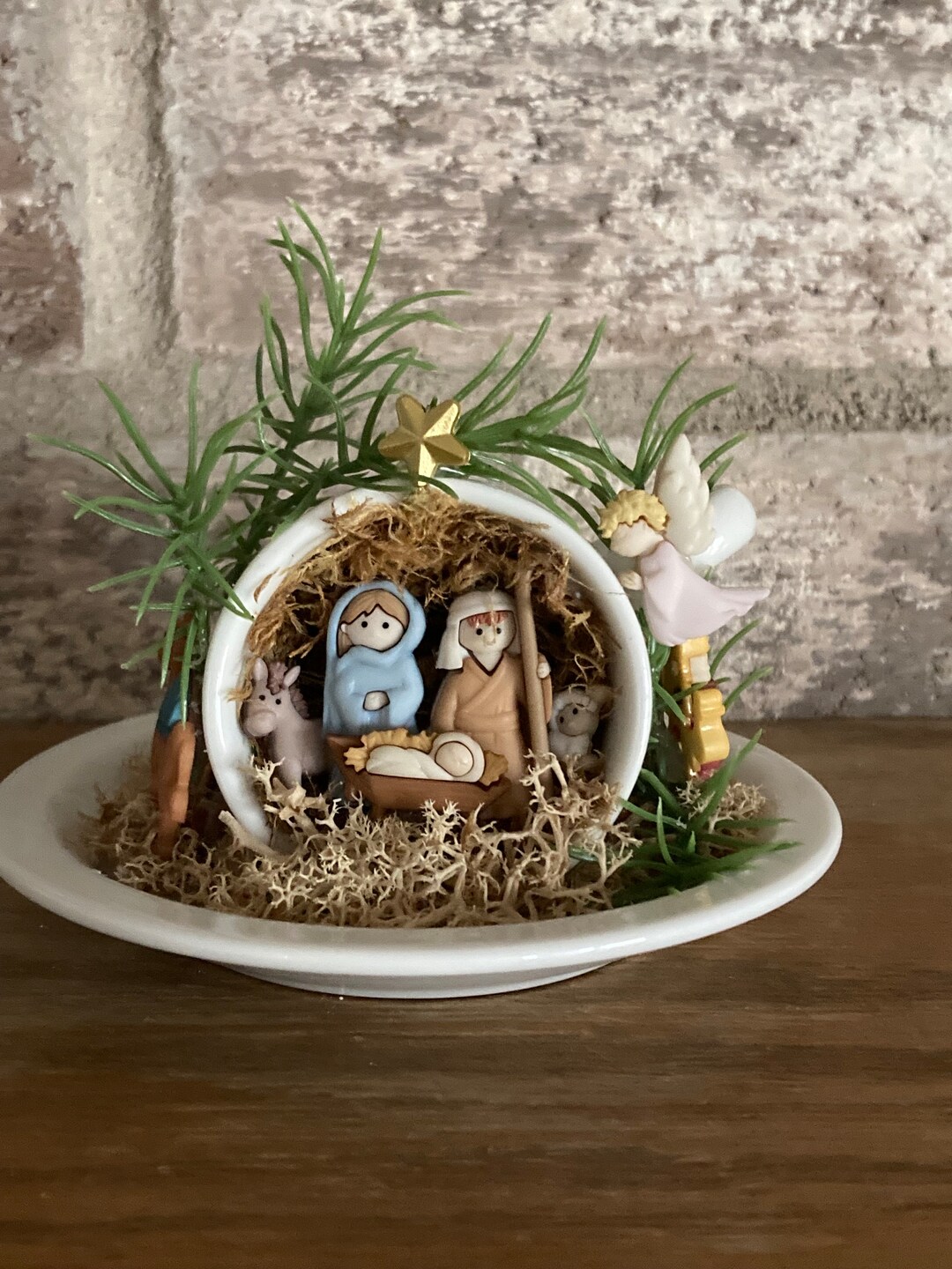 Mini Nativity Figures With Three Wise Men in Small White Cup and Saucer ...