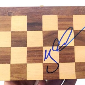 Magnus Carlsen Autographed Chess Board: A Grandmaster's Signature on a ...