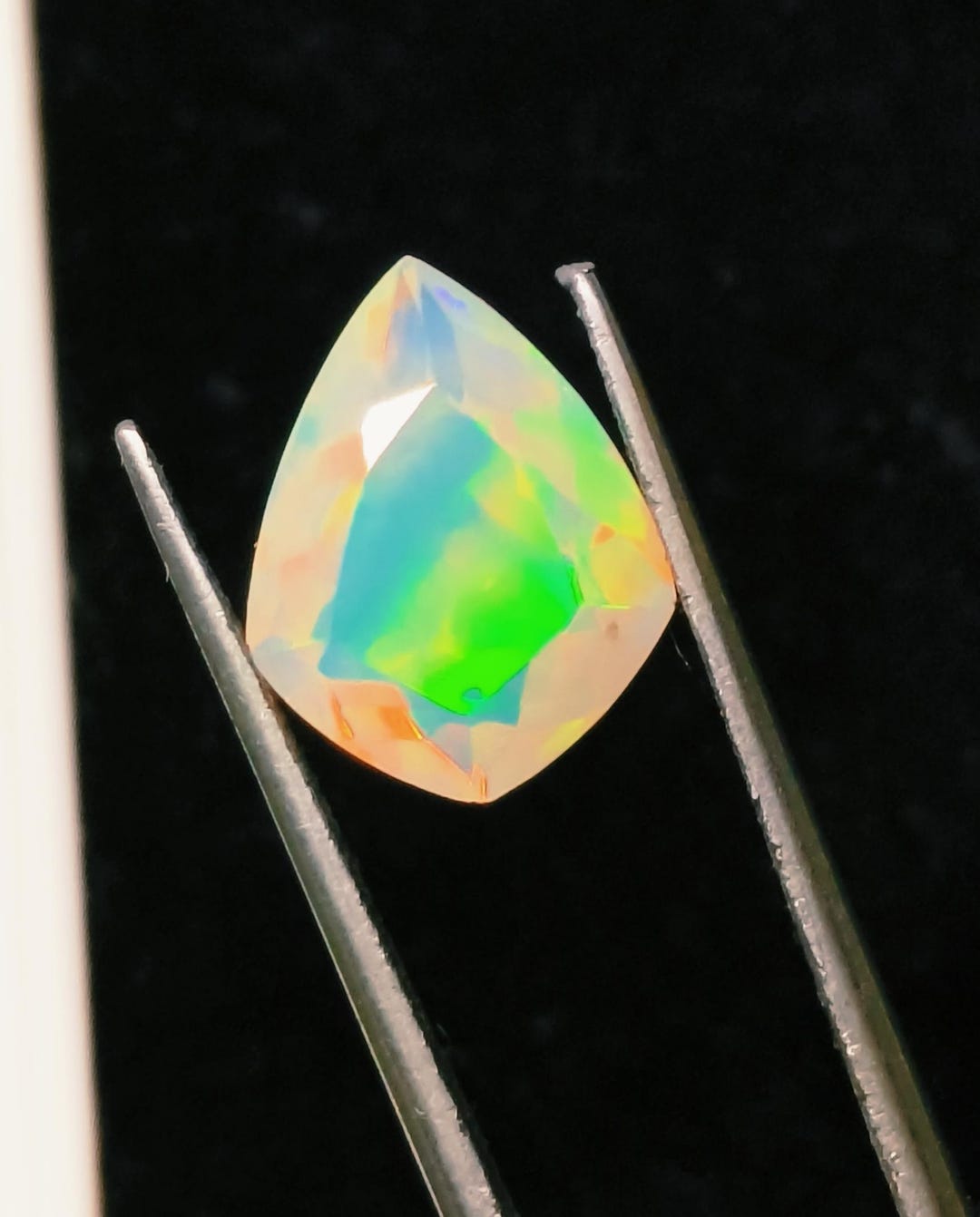 AAA++ Faceted Ethiopian Opal Shield Shape: 2.00 Carat Gemstone 11.5x9x6 ...