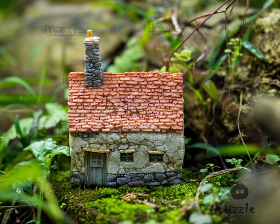 Miniature Fairy Cottages In Terrariums