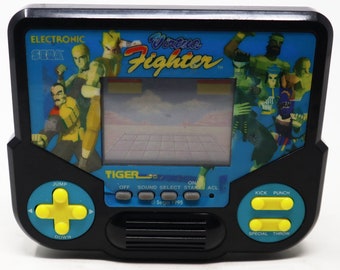 Rare EA Sports Tiger Woods LCD Electronic Handheld Tournament Golf Game ...