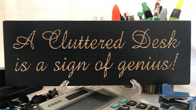 Wooden Engraved Sign - A Clutterd Desk is a Sign of Genius. - Etsy