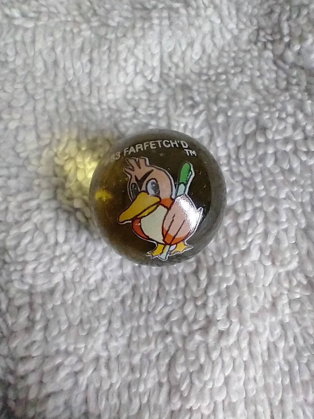 Vintage Pokemon Marble #83 Farfetched on Yellow Glass Shooter Marble ...