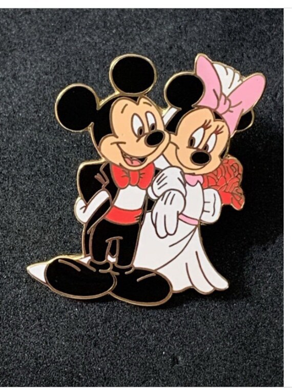 Old Mickey Mouse And Minnie Mouse Holding Hands
