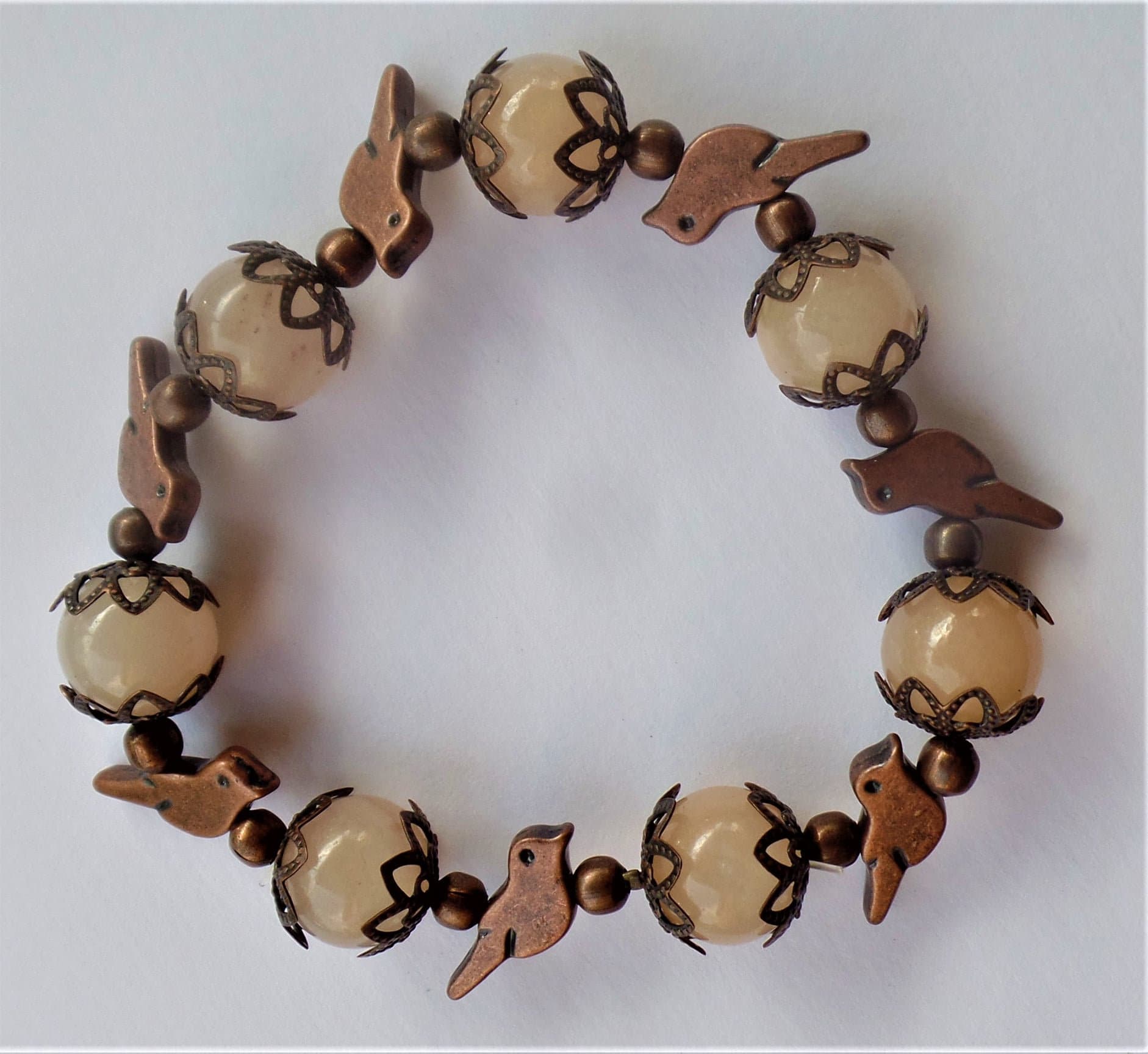 Elastic Peach Quartzite Bronze Bird Bracelet - Etsy