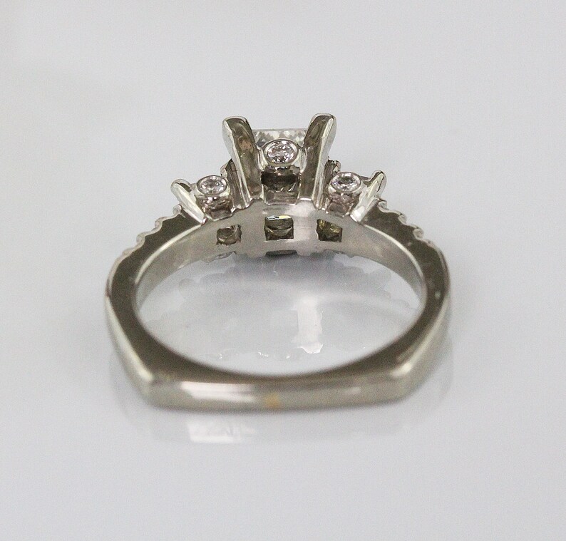 Fabulous 1.15ct Center Princess Cut Diamond and 0.70ct Side Diamonds ...