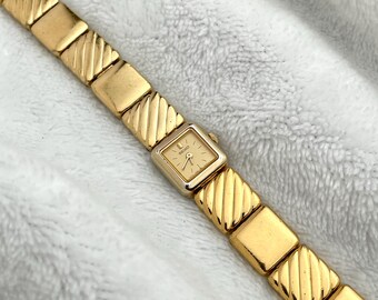 Vintage SEIKO With Rare Blue Tone Half Moon Quartz Watch With Black ...