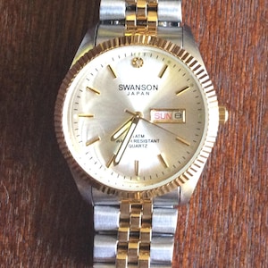 SWANSON Men's Watch Round Silver Dial Gold Index Hour Markers on Two ...