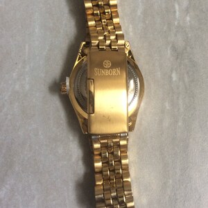 SUNBORN Women's Gold Watch Round Gold Dial Day & Date Gold Dial Crystal ...