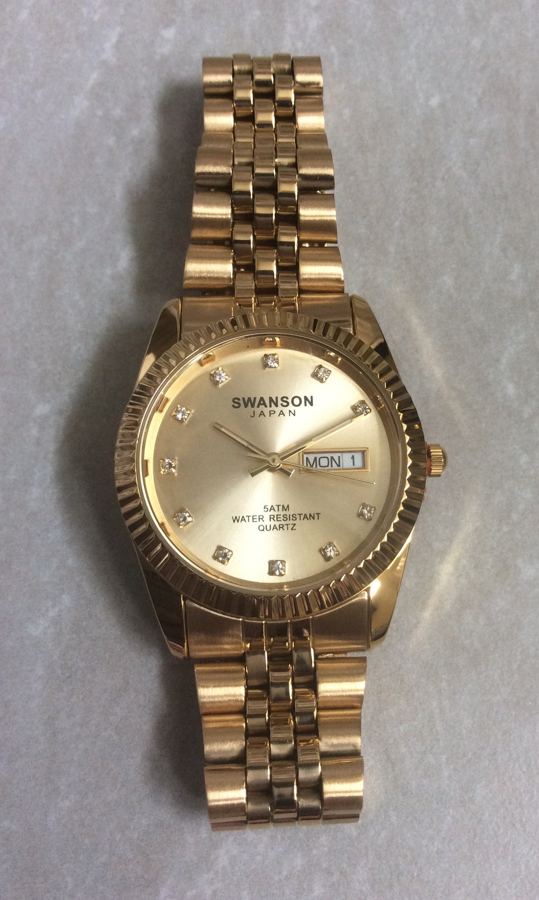 Swanson Gold Men's Watch Round Gold Dial Crystal Hour Markers on a Gold ...