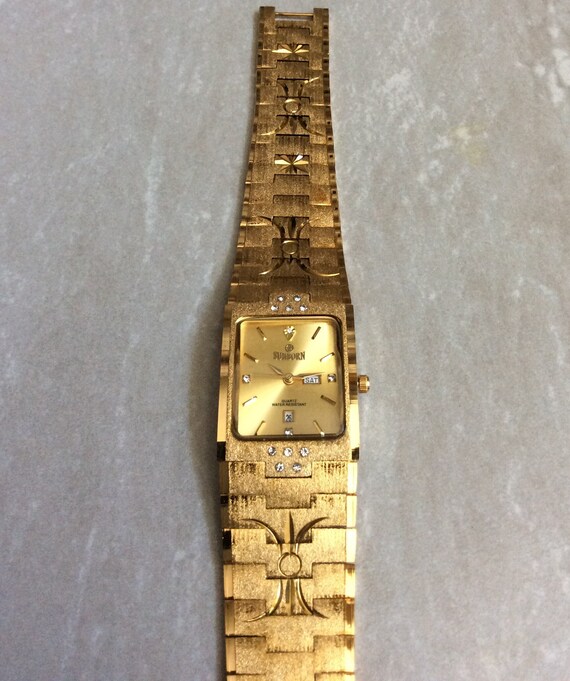 SUNBORN Men's Gold Watch Having a Rectangle Gold Dial… - Gem