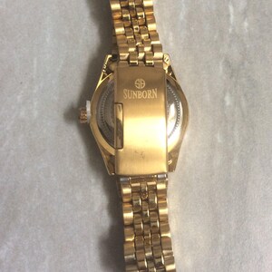 SUNBORN Women's Gold Watch Round Gold Dial Day & Date Gold Dial Crystal ...