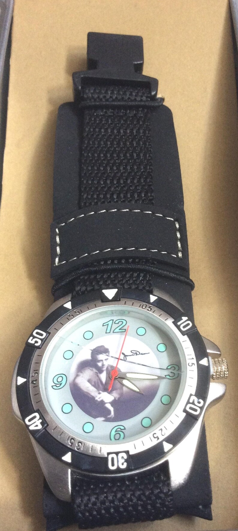 James Dean Men's Silver Watch Having a Round Gray Dial on a Black Nylon ...
