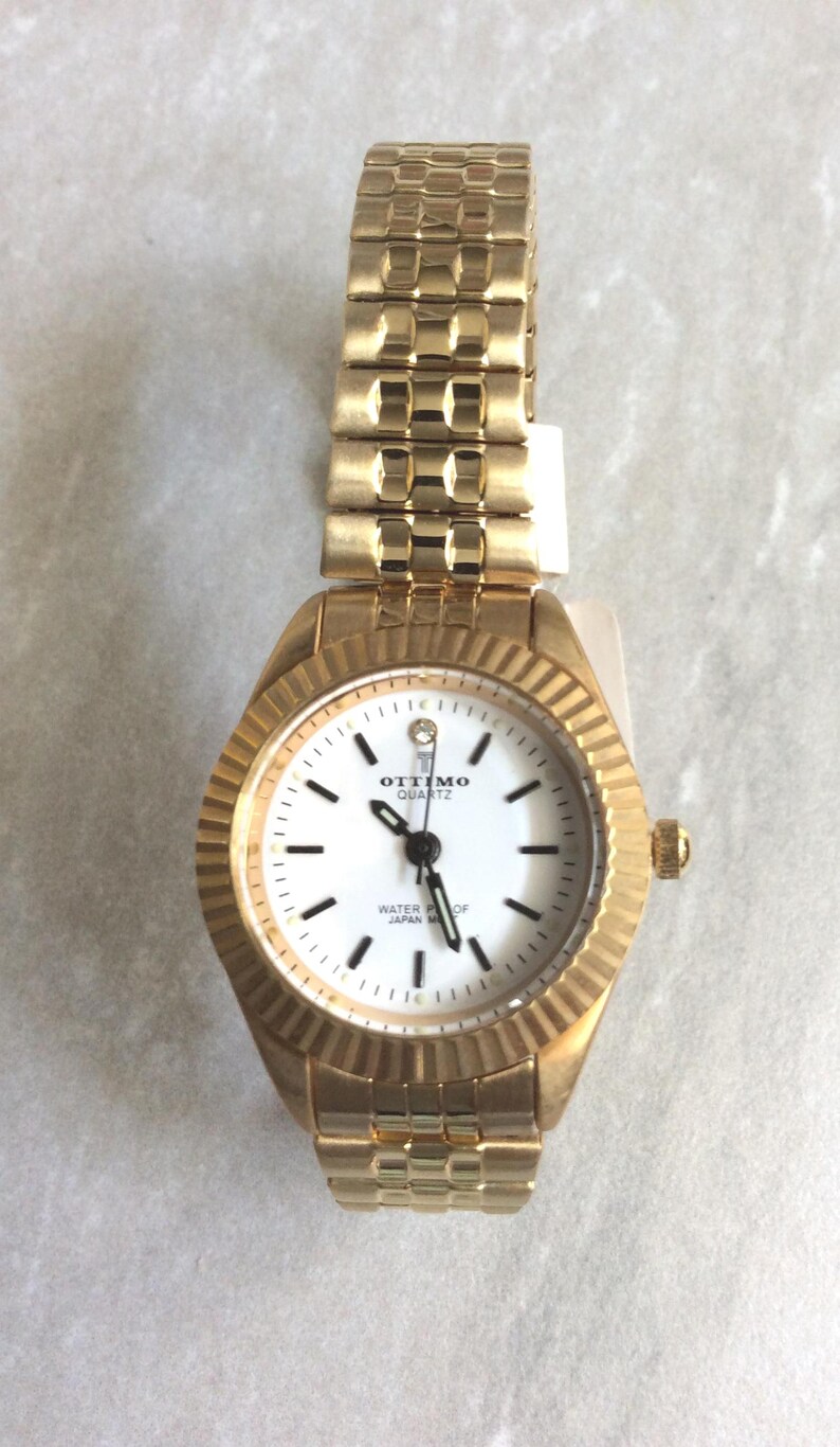 OTTIMO Gold Women's Watch Round White Dial Black Index Hours on Gold ...