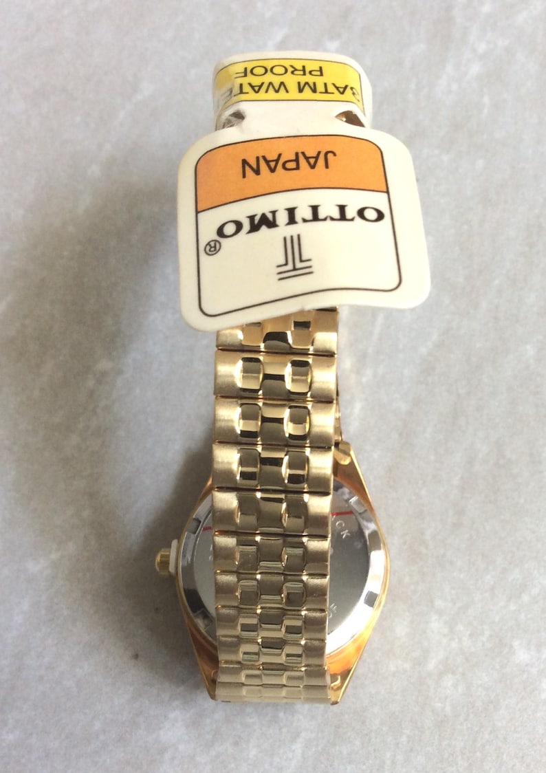 OTTIMO Gold Women's Watch Round White Dial Black Index Hours on Gold ...
