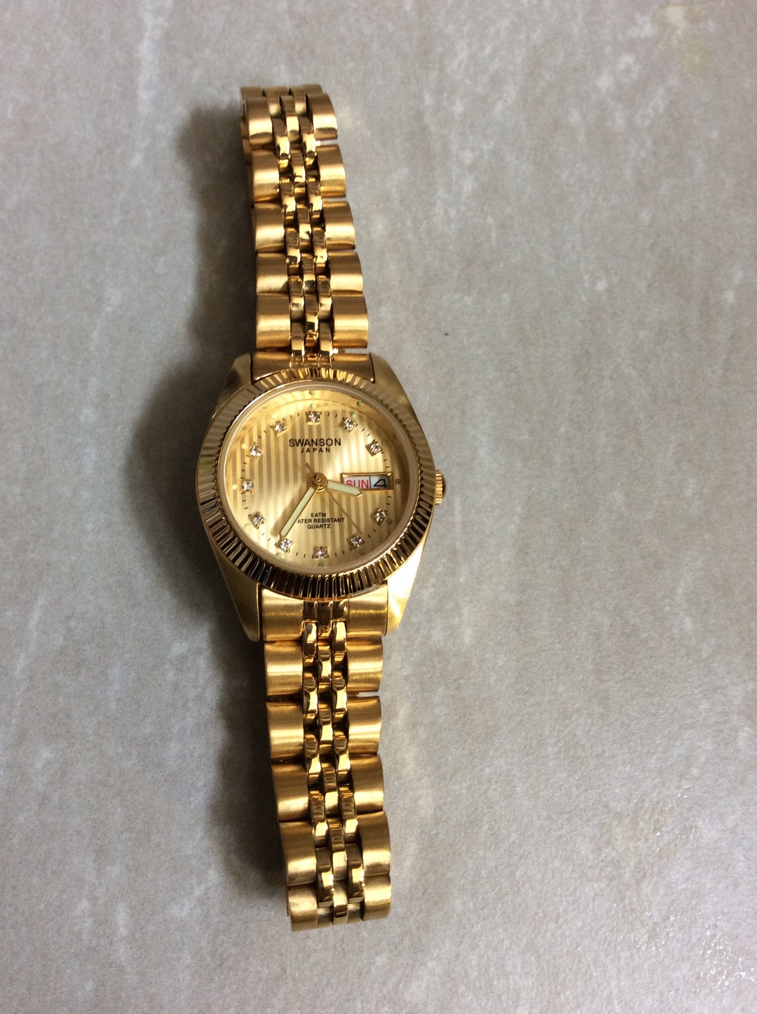 SWANSON WOMEN'S WATCH Round Gold Accented Dial Crystal Hour Markers ...