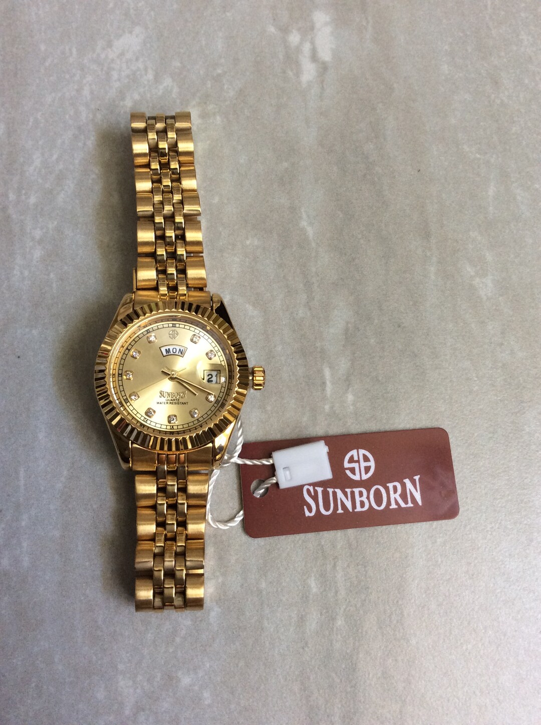 SUNBORN Gold Women's Watch Round Gold Dial Crystal Hour Markers Day and ...