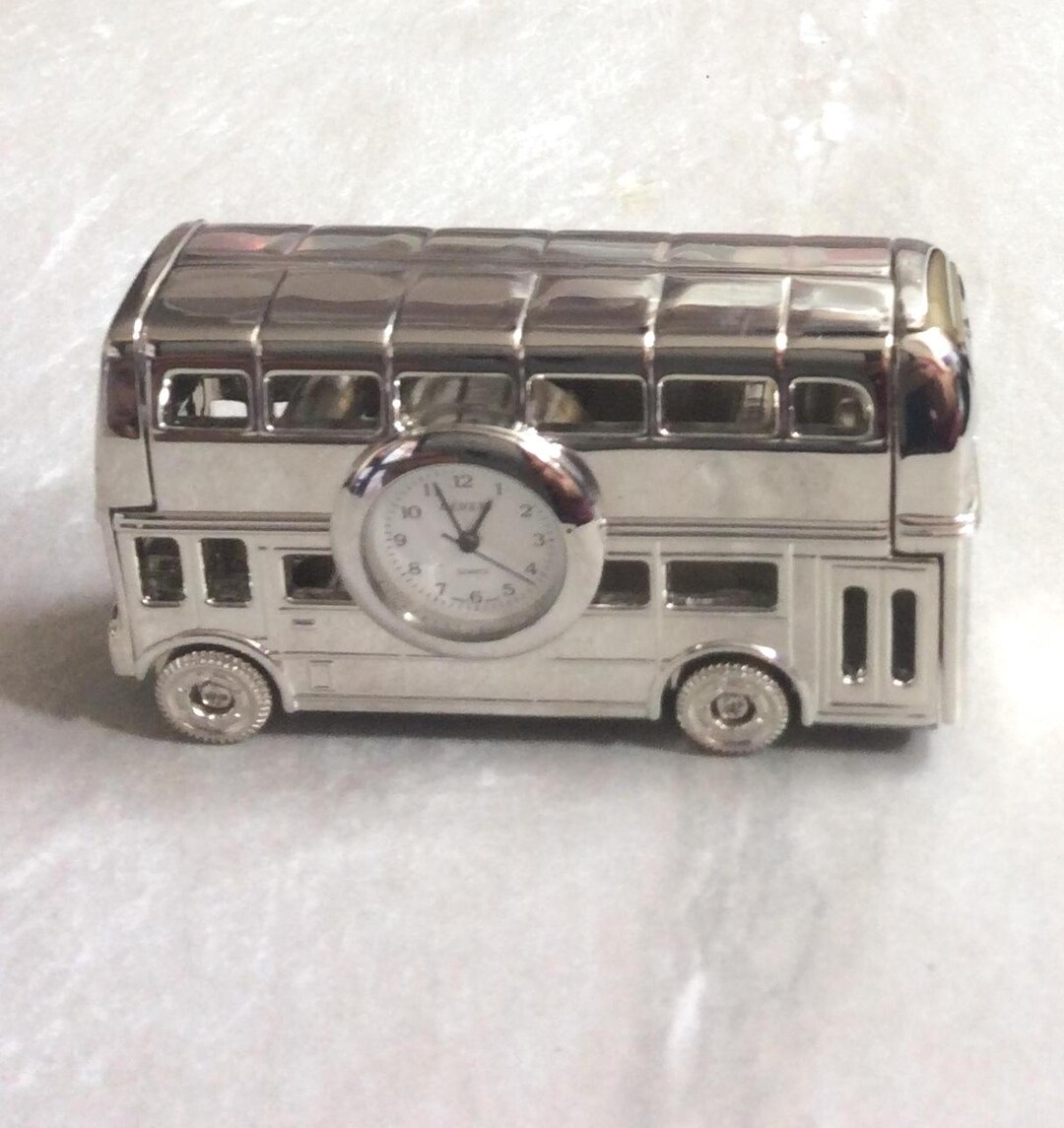 GENEVA Double Decker Bus Clock Having a Round White Dial Displaying ...