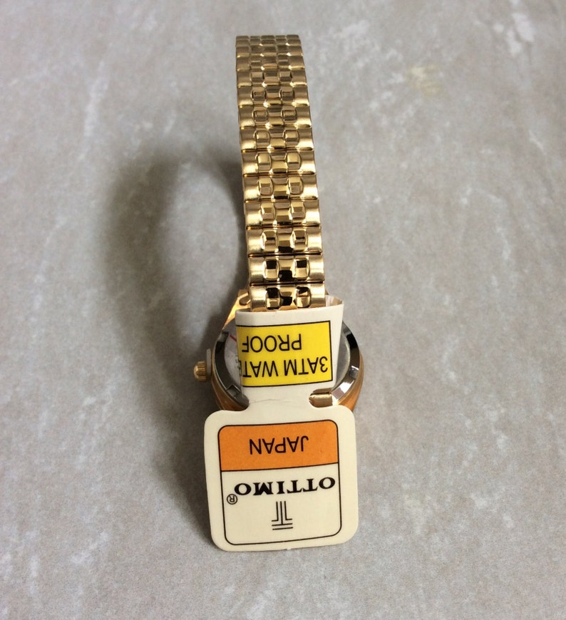 OTTIMO Women's Watch Round White Dial Black Index Hours on Gold Stretch ...