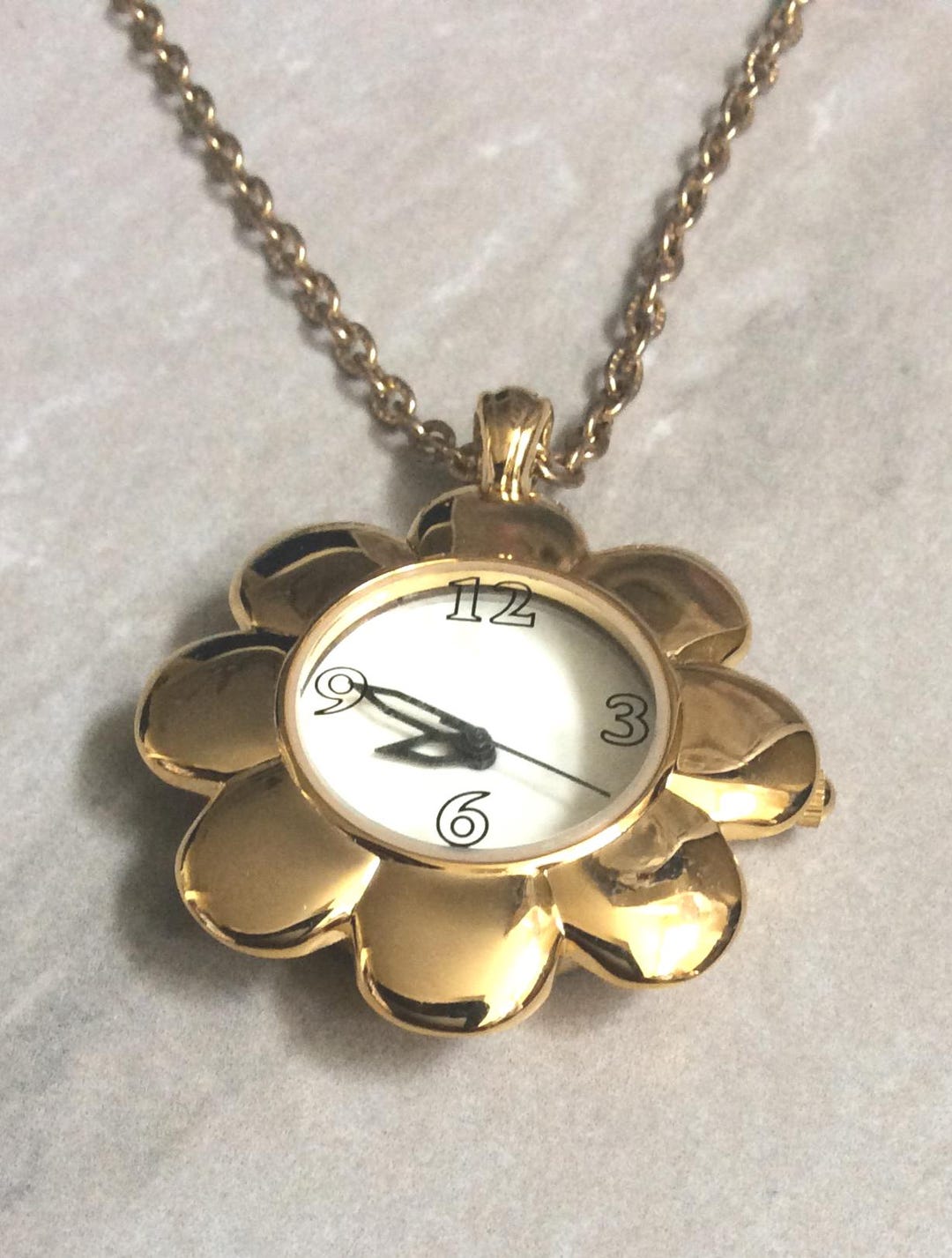 Gold Flower Pendant Necklace Round White Dial Roaming Crystals Black ...