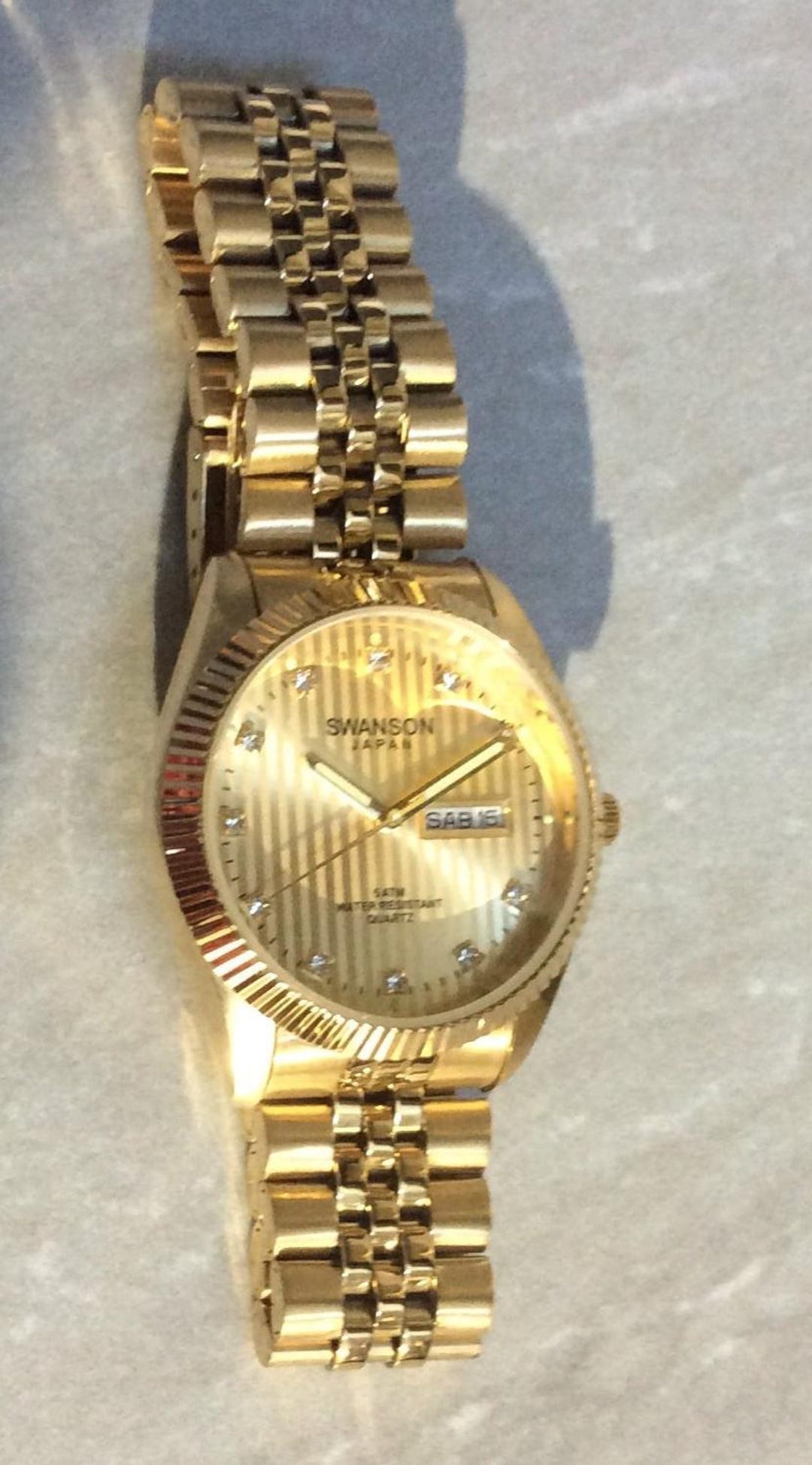 Swanson Gold Waterproof Men's Watch Round Accented Gold Dial Displaying ...