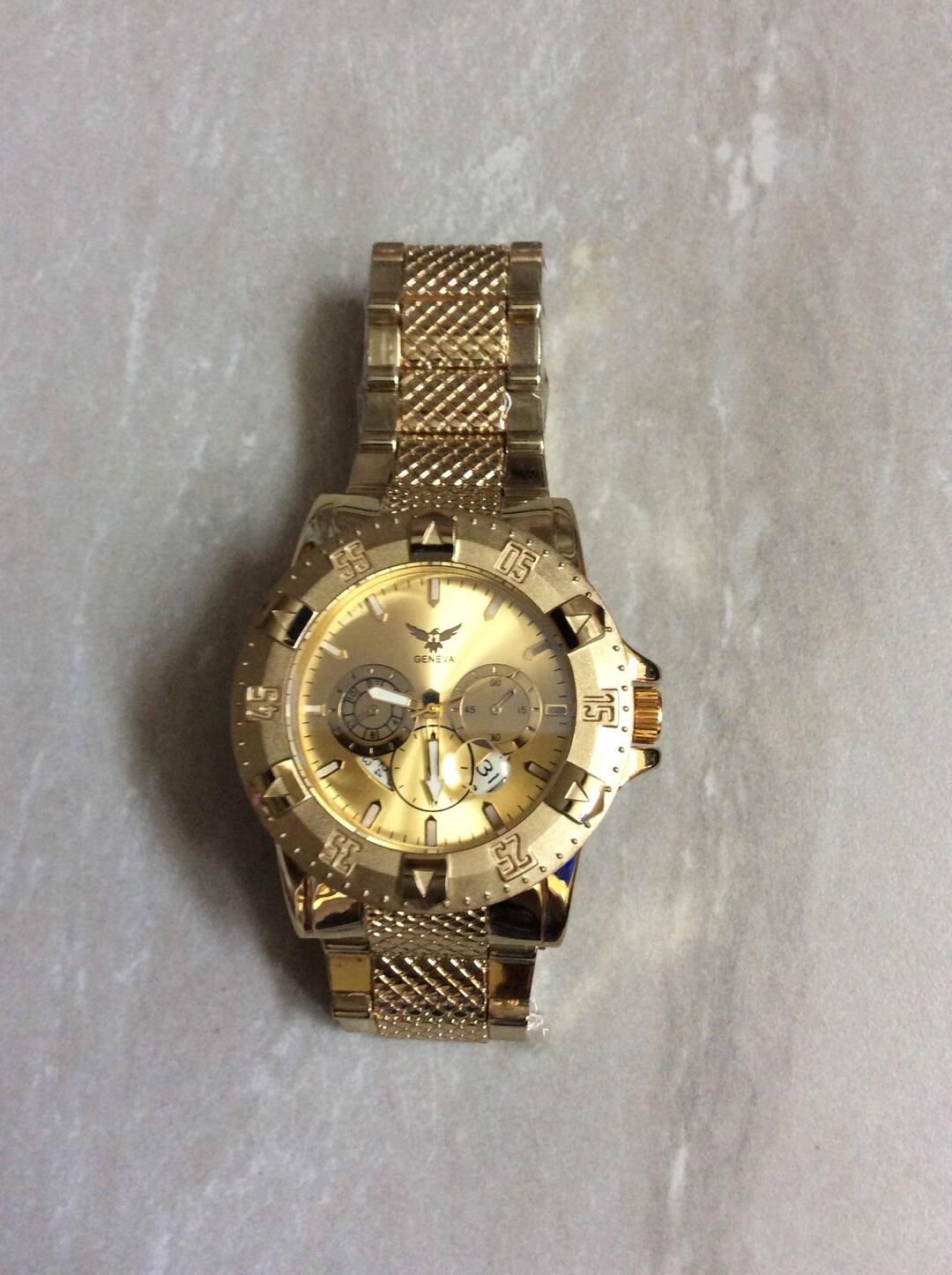 GENEVA Automatic Gold Men's Watch Round Gold Dial Day & Date on a Gold ...