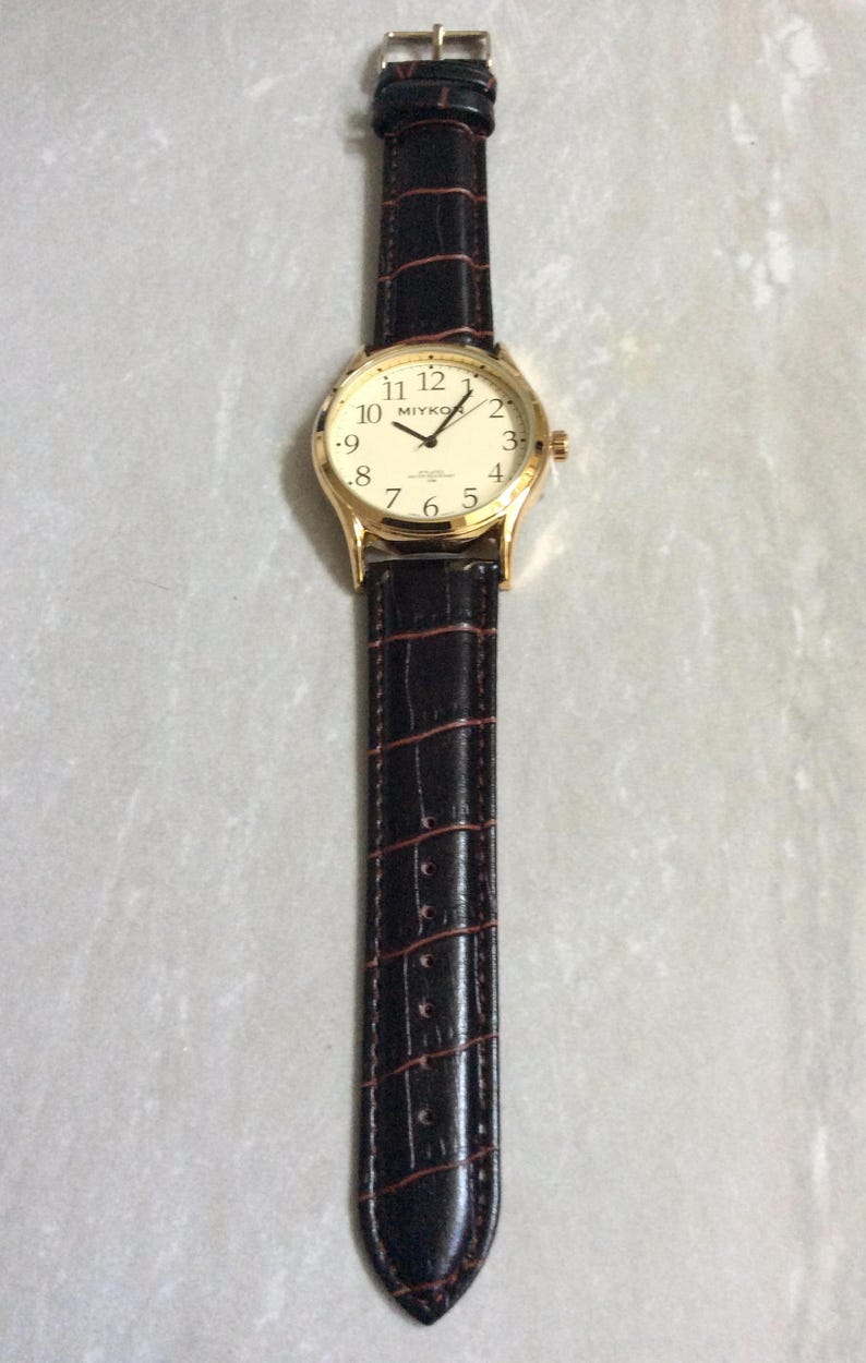 MIYKON Gold Men's Watch Round Beige Dial Black Numbered Hours on a ...