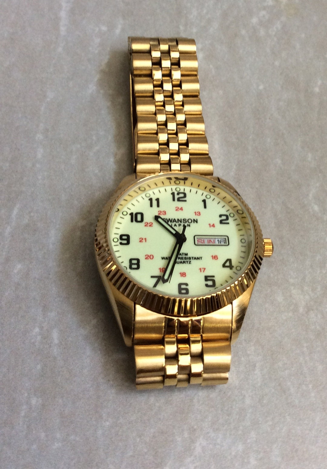 SWANSON Men's Gold Watch Having a Round Glow in the Dark Dial 12/24 ...