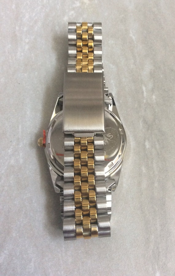 SWANSON Men's Watch having a Round Gold Sunray Dial C… - Gem