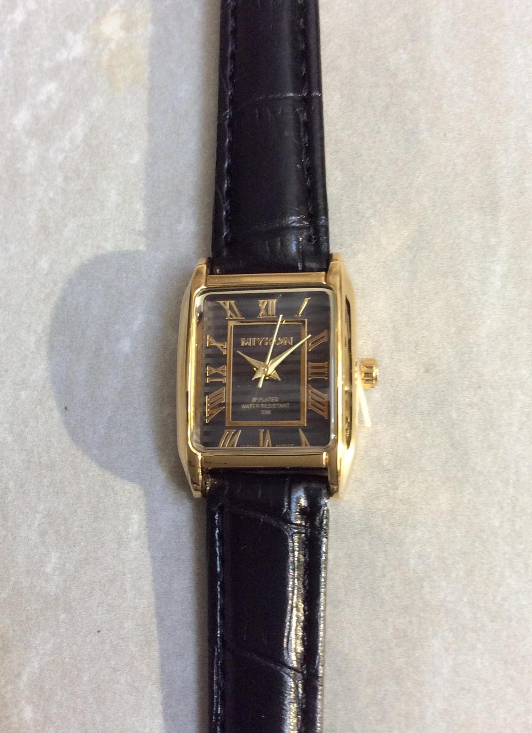 Miykon Women's Gold Rectangle Watch Black Accented Dial Gold Roman ...