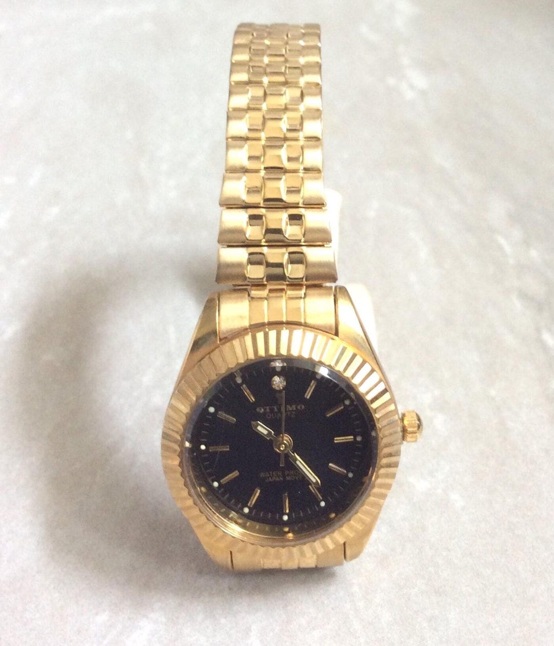 OTTIMO Women's Gold Watch Round Black Dial Displaying Gold Index Hours ...