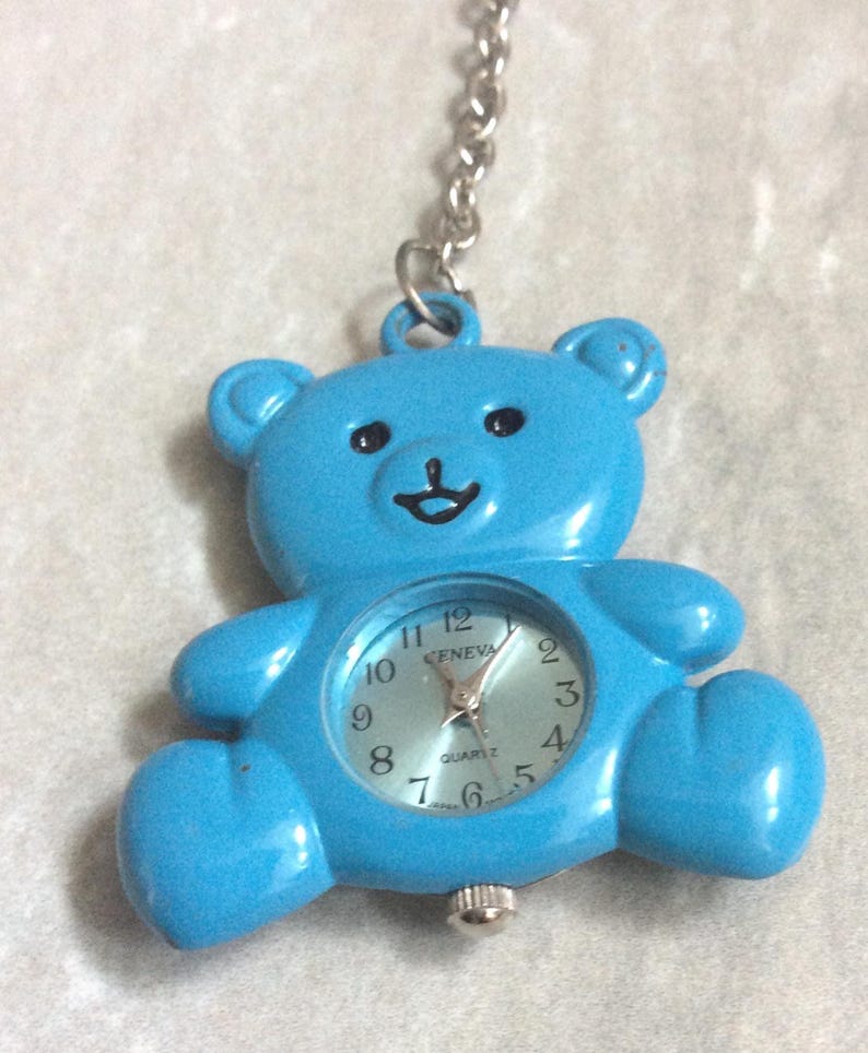 Blue Teddy Bear With Clock Keychain Having a Round Blue Dial Numbered ...