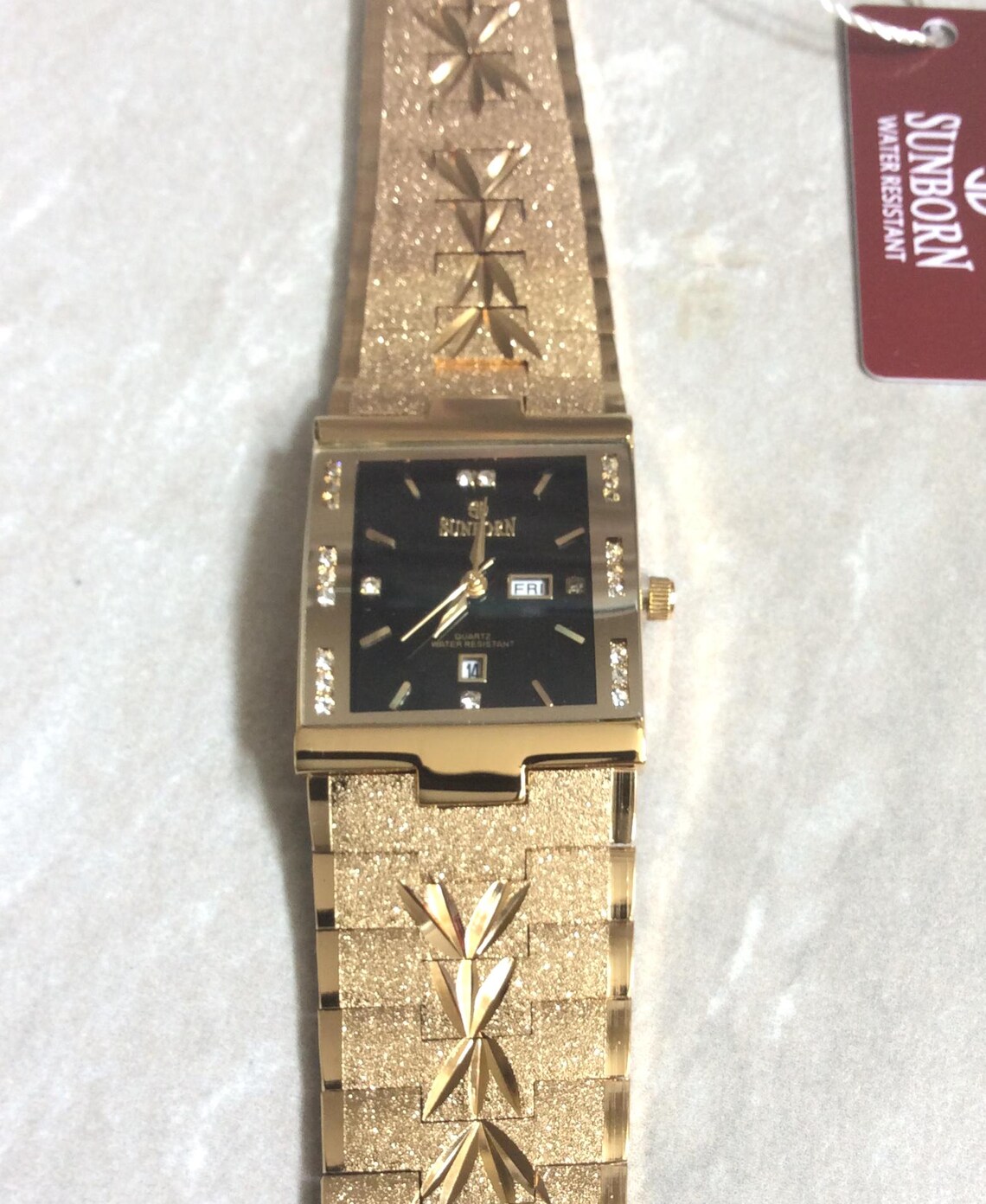 SUNBORN Crystal Gold Men's Watch Having a Rectangle Black Dial With ...