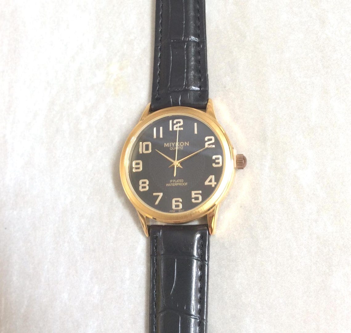 MIYKON Men's Gold Watch, Having a Round Black Dial Displaying Gold ...