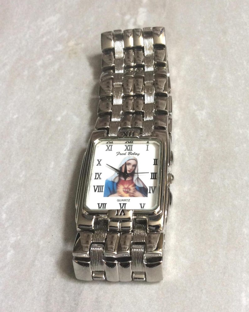 Fred Belay Silver Men's Religious Watch White Guadalupe Dial Black ...