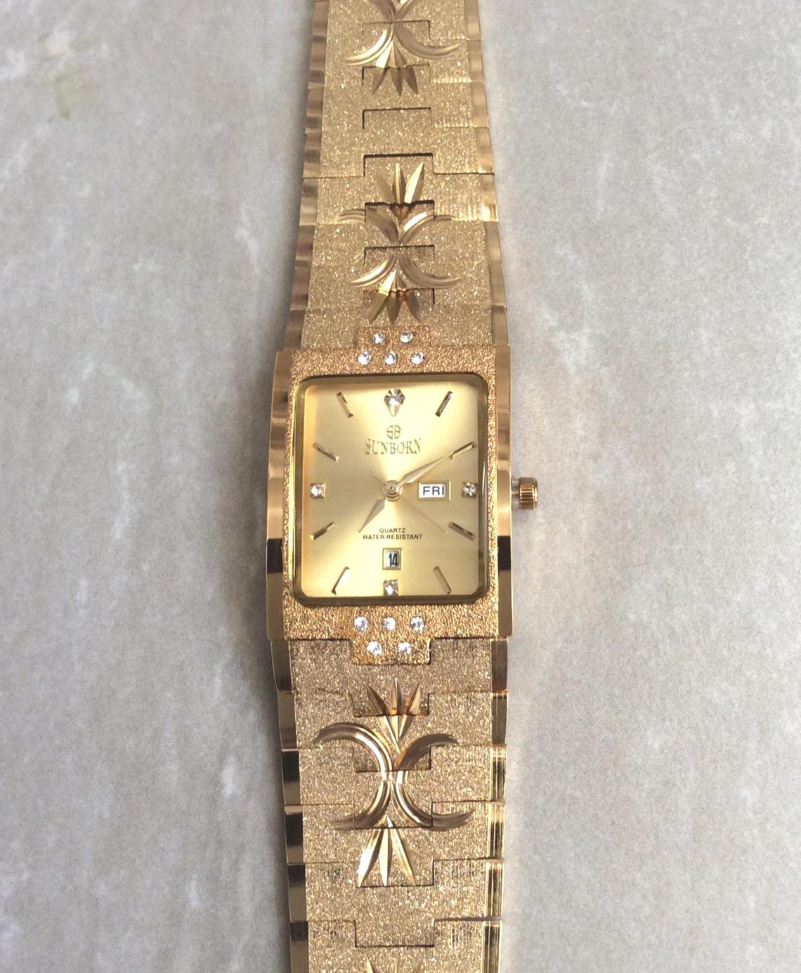 SUNBORN Men's Watch Having a Gold Rectangle Dial With Crystal Accent ...