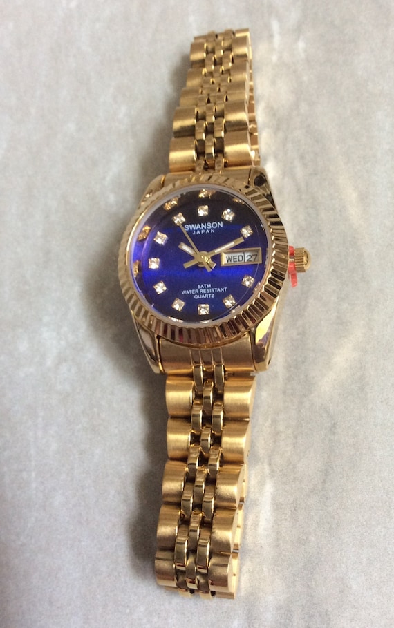 Swanson Women's Watch Round Gold Crystal Dial Blue Cr… - Gem