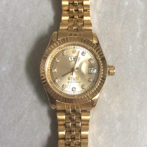 SUNBORN Women's Gold Watch Round Gold Dial Day & Date Gold Dial Crystal ...