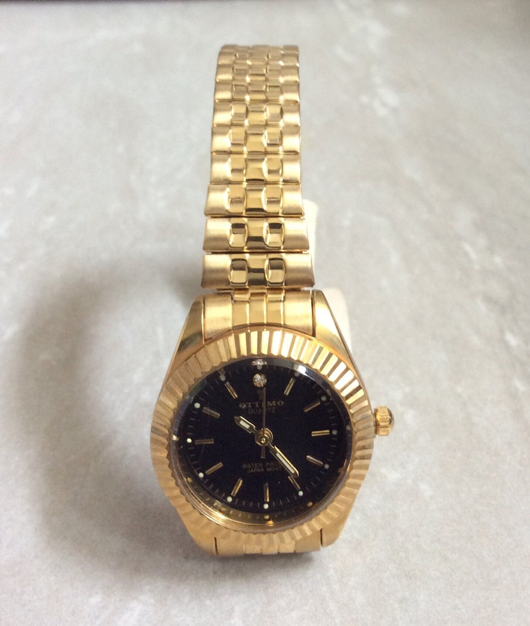 OTTIMO Women's Gold Watch Round Black Dial Displaying Gold Index Hours ...