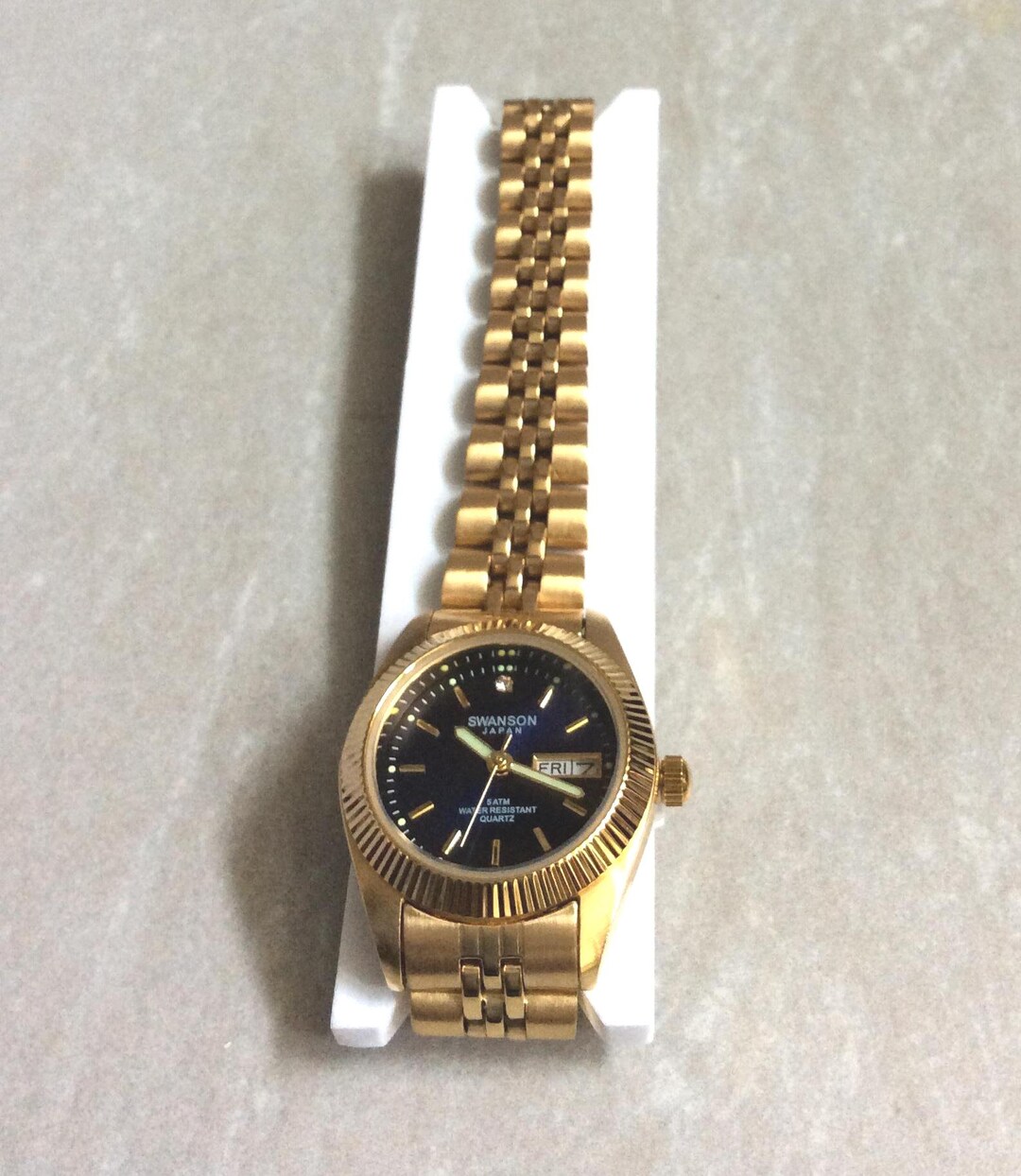 SWANSON Women's Gold Watch Round Blue Dial Gold Index Hours on a Gold ...