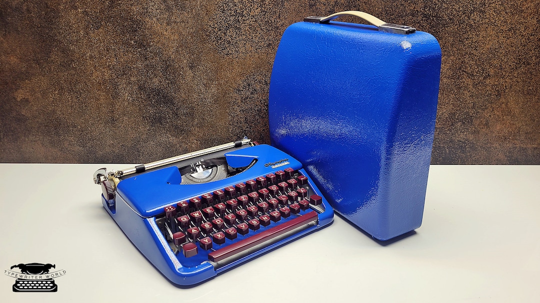 German-made Olympia Splendid 33/66 Blue Typewriter With Mechanical ...