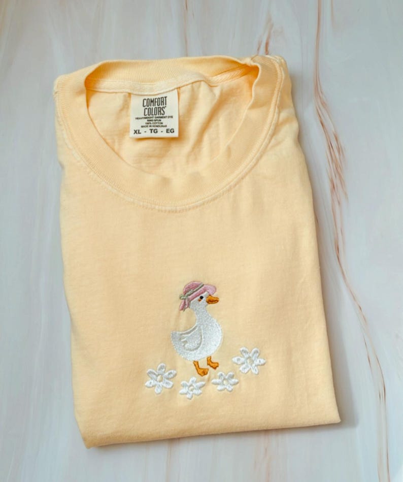 Goose With Hat Embroidered T-shirt – Pastel Yellow With Floral Details ...