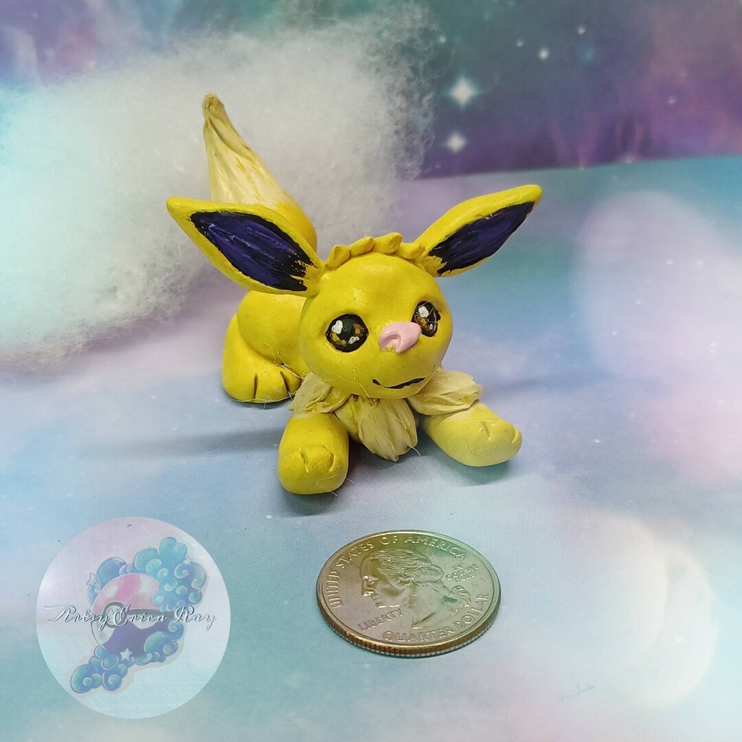 Yellow Eevee Figurine - Etsy