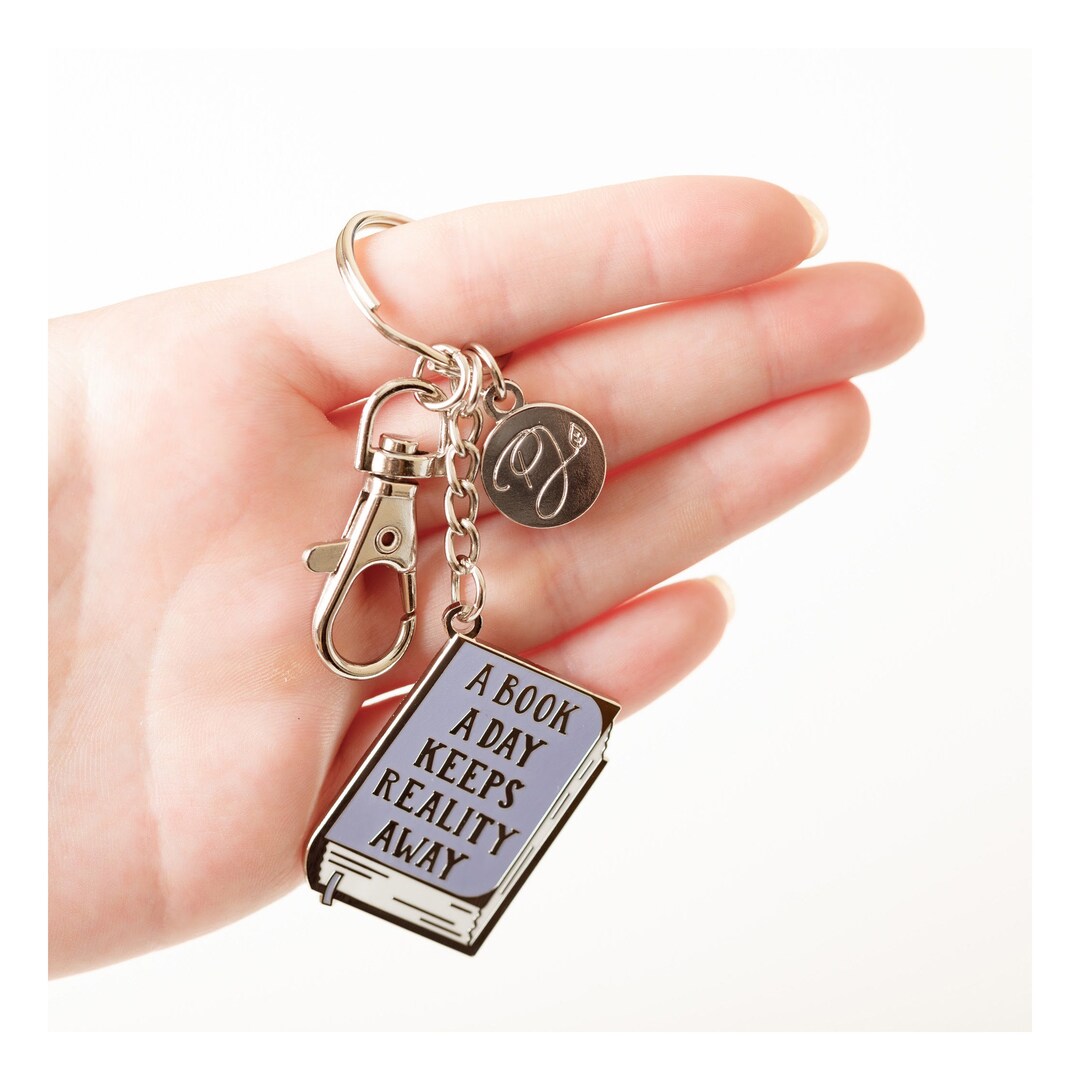 Book Lover's Hard Enamel Keyring / A Book A Day Keeps Reality Away Hard ...
