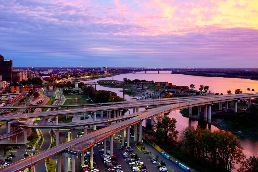Mississippi River & Memphis Tennessee Skyline With Its Bridges Crossing ...