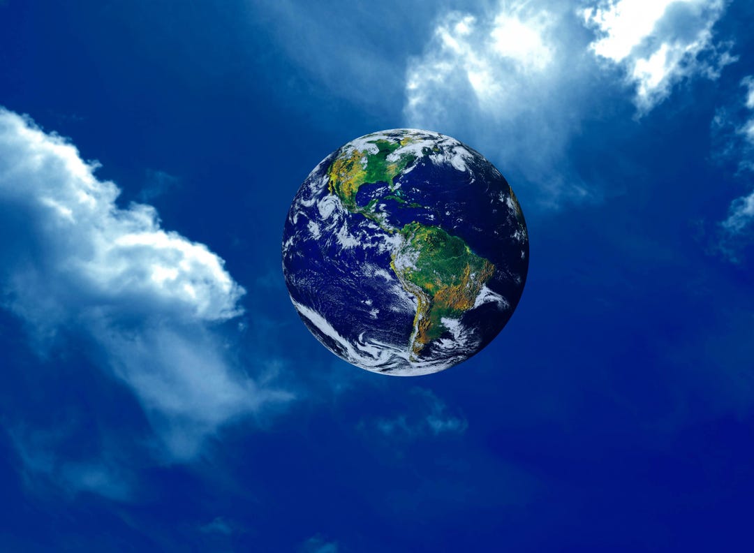 Earth Glowing in a Night Sky With Clouds & Moon From Deep Space Canvas ...