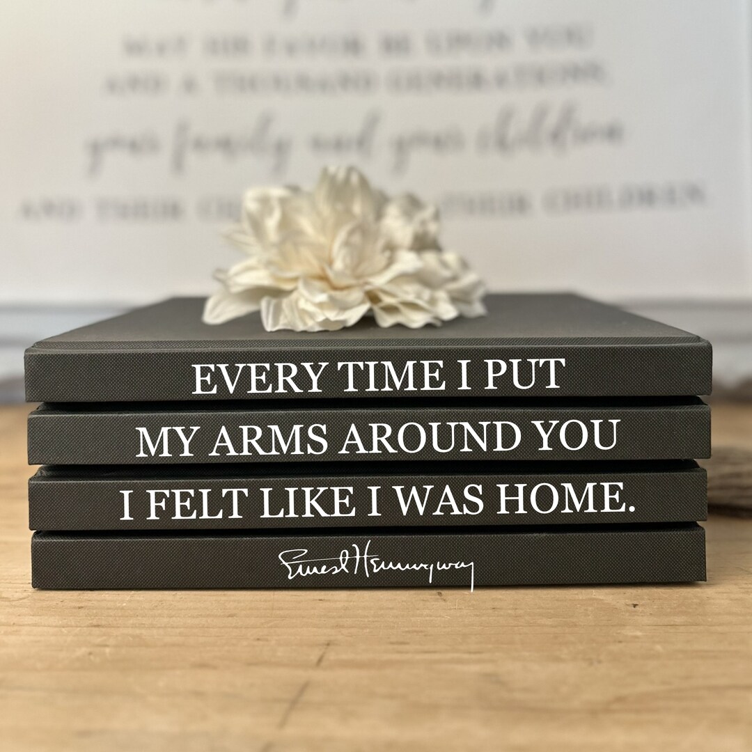 Modern Coffee Table Book Stacks Featuring Ernest Hemingway's Wisdom on ...